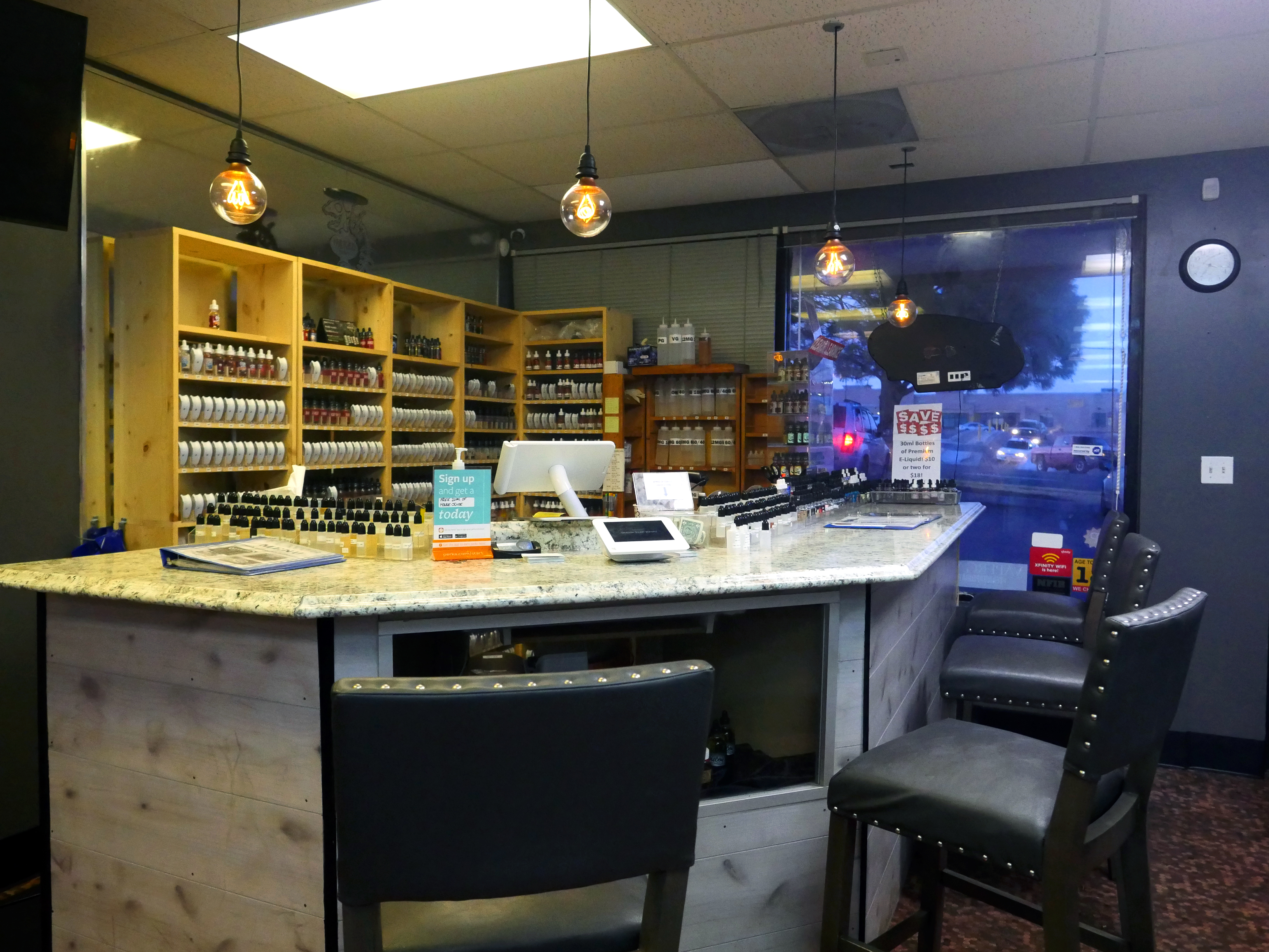 Dragons Lair Vapors - Vape Shop Lounge New Juice Bar Design