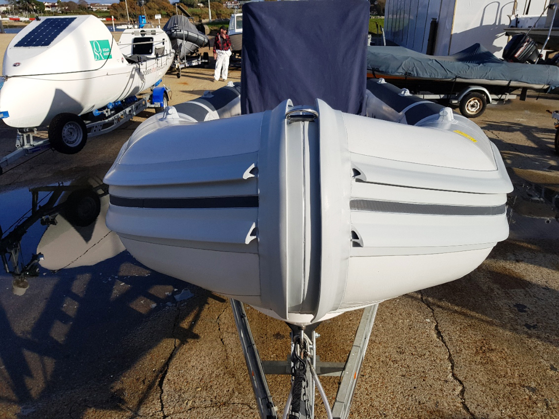 Ballistic Rib retube with black fabric impression wear patches - Rib ...