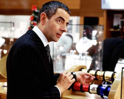 Love Actually Rowan Atkinson as Rufus prepares his wrapping 8x10 inch ...