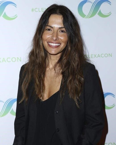 Sarah Shahi in black jacket smiles for press on red carpet 8x10 inch ...