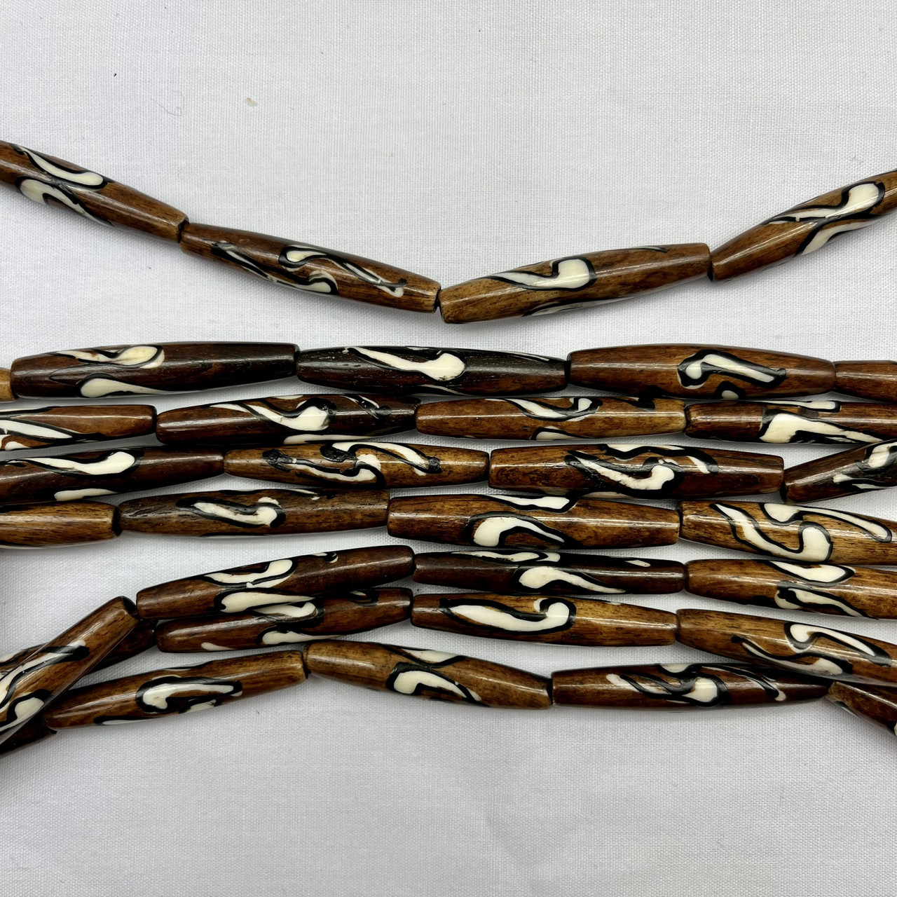 MUD BONE HALF MOON #4 1-1/2" 11PCS/STRAND - Western Varieties