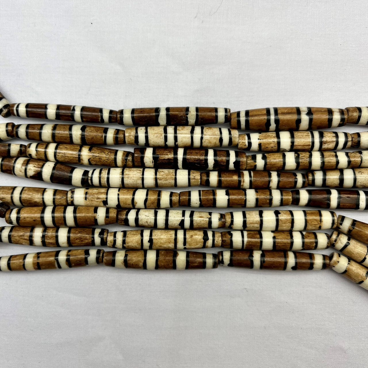 MUD BONE STRIPES #3 1-1/2" 11PCS/STRAND - Western Varieties