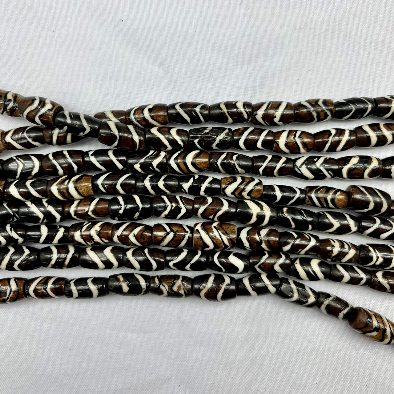 MUD BONE WAVES #5 1/2" 32PCS/STRAND - Western Varieties